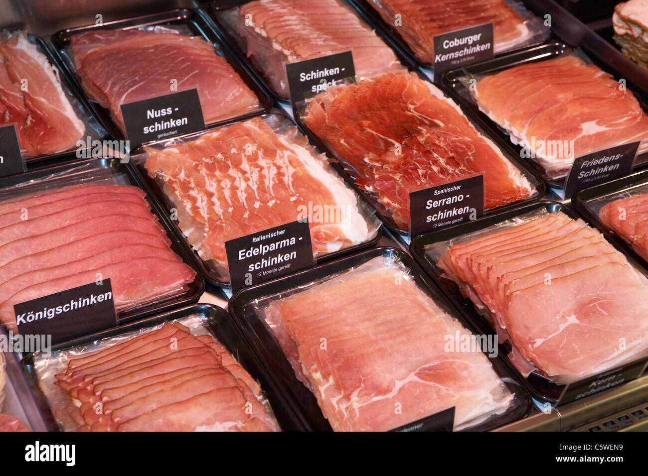 Differrent Ham in display in supermarket, close-up Stock Photo - Alamy