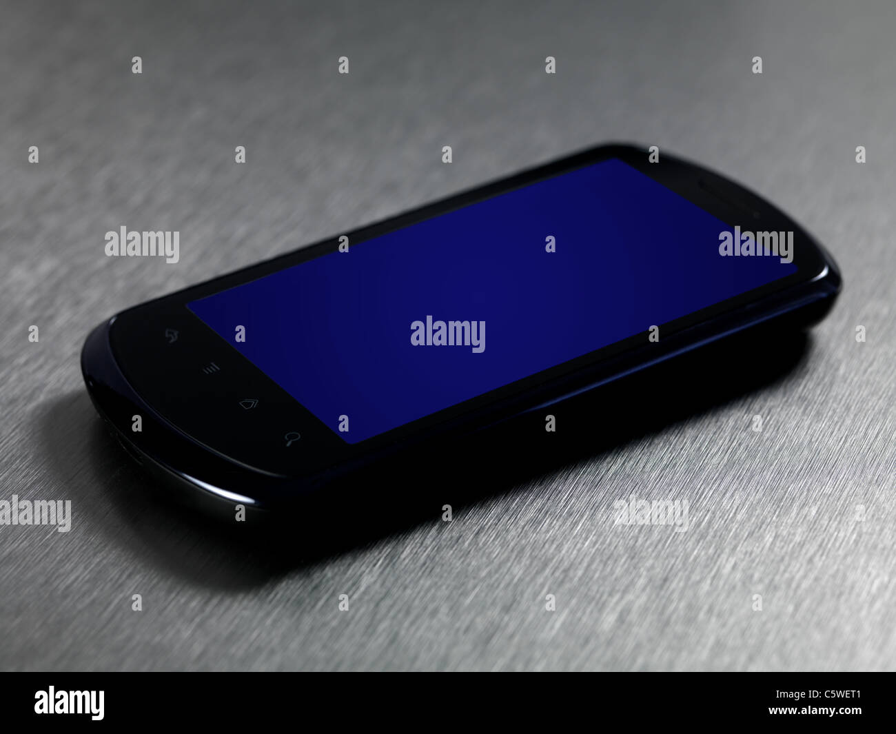 A modern mobile phone on a kitchen bench Stock Photo - Alamy