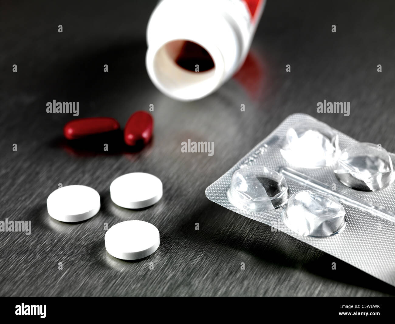 Assorted medication equipment on a bench top Stock Photo - Alamy