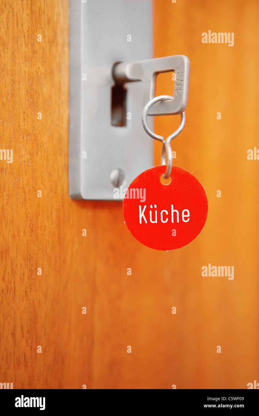 Kitchen Key in keyhole, close-up Stock Photo - Alamy