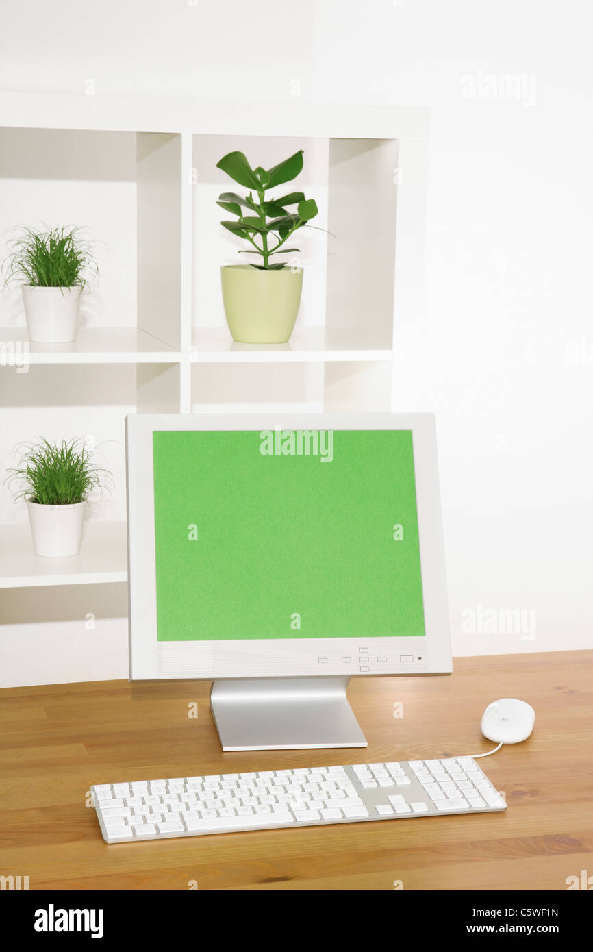 Germany, Workplace, Computer screen in green Stock Photo - Alamy