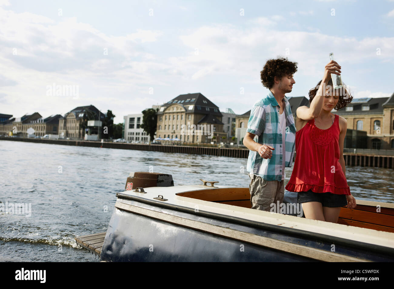Germany, Berlin, Young couple having fun Stock Photo - Alamy