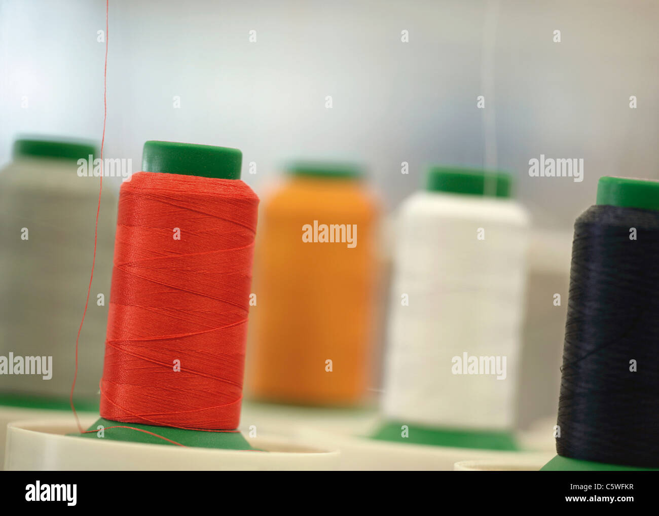 Close-up of multi coloured threads Stock Photo - Alamy