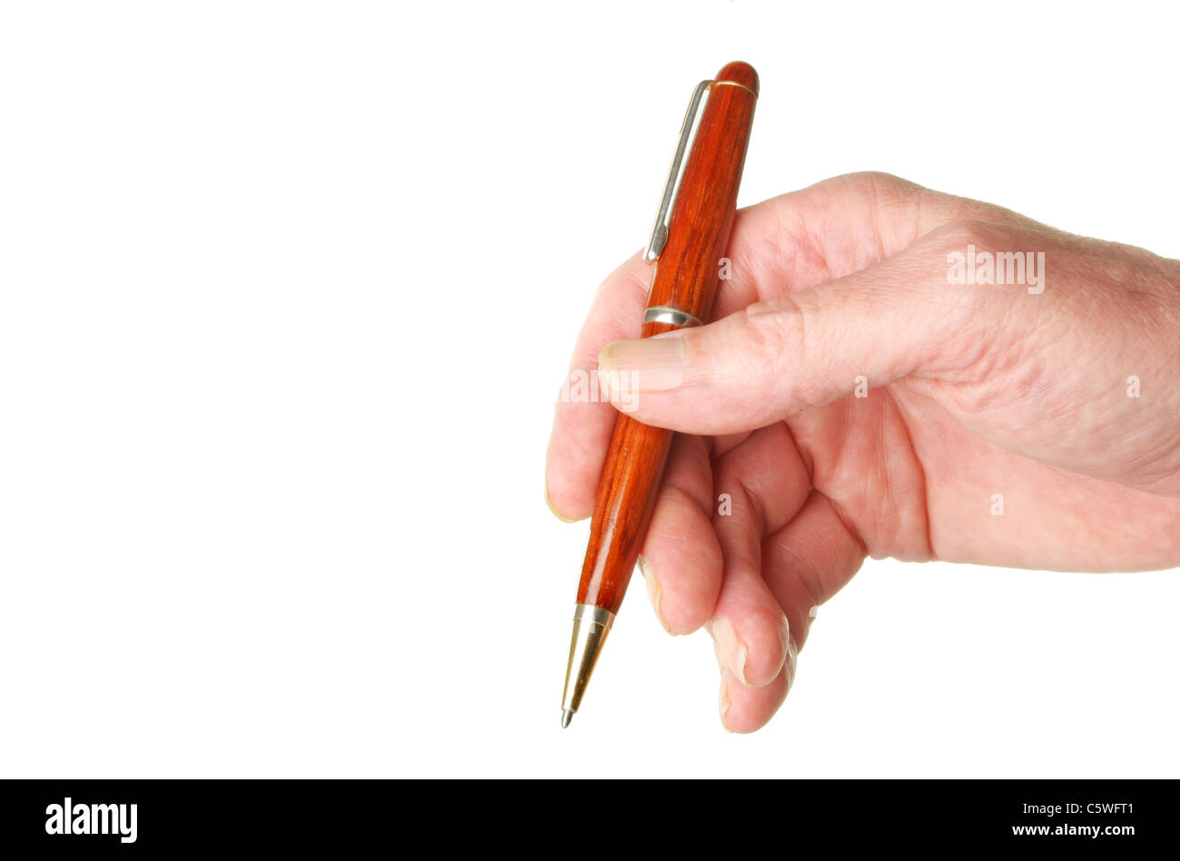 Closeup of a males hand holding a pen isolated against white Stock ...