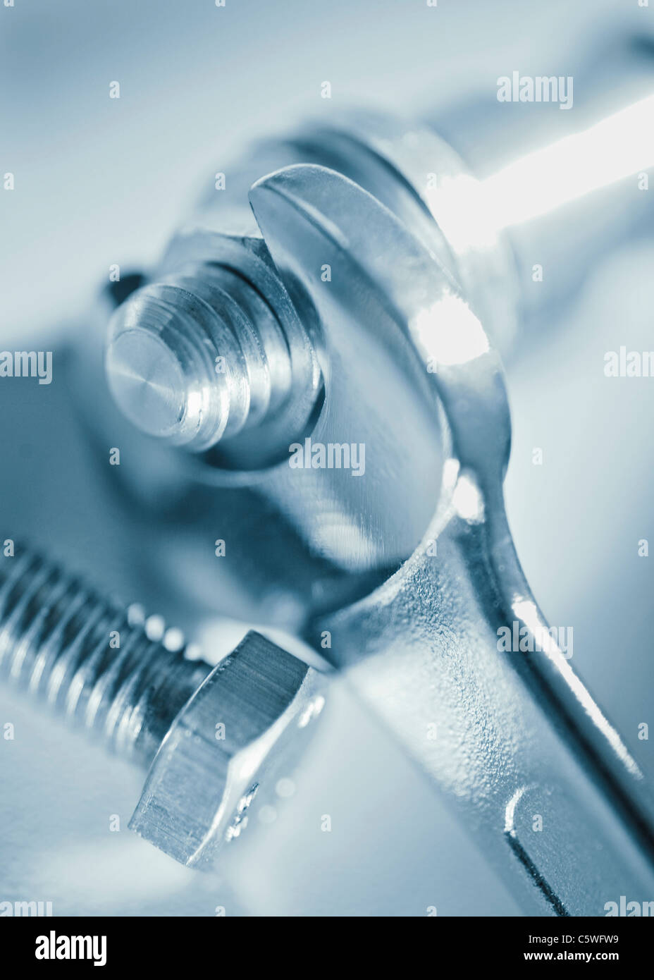 Tools, wrench and screw, close up Stock Photo - Alamy