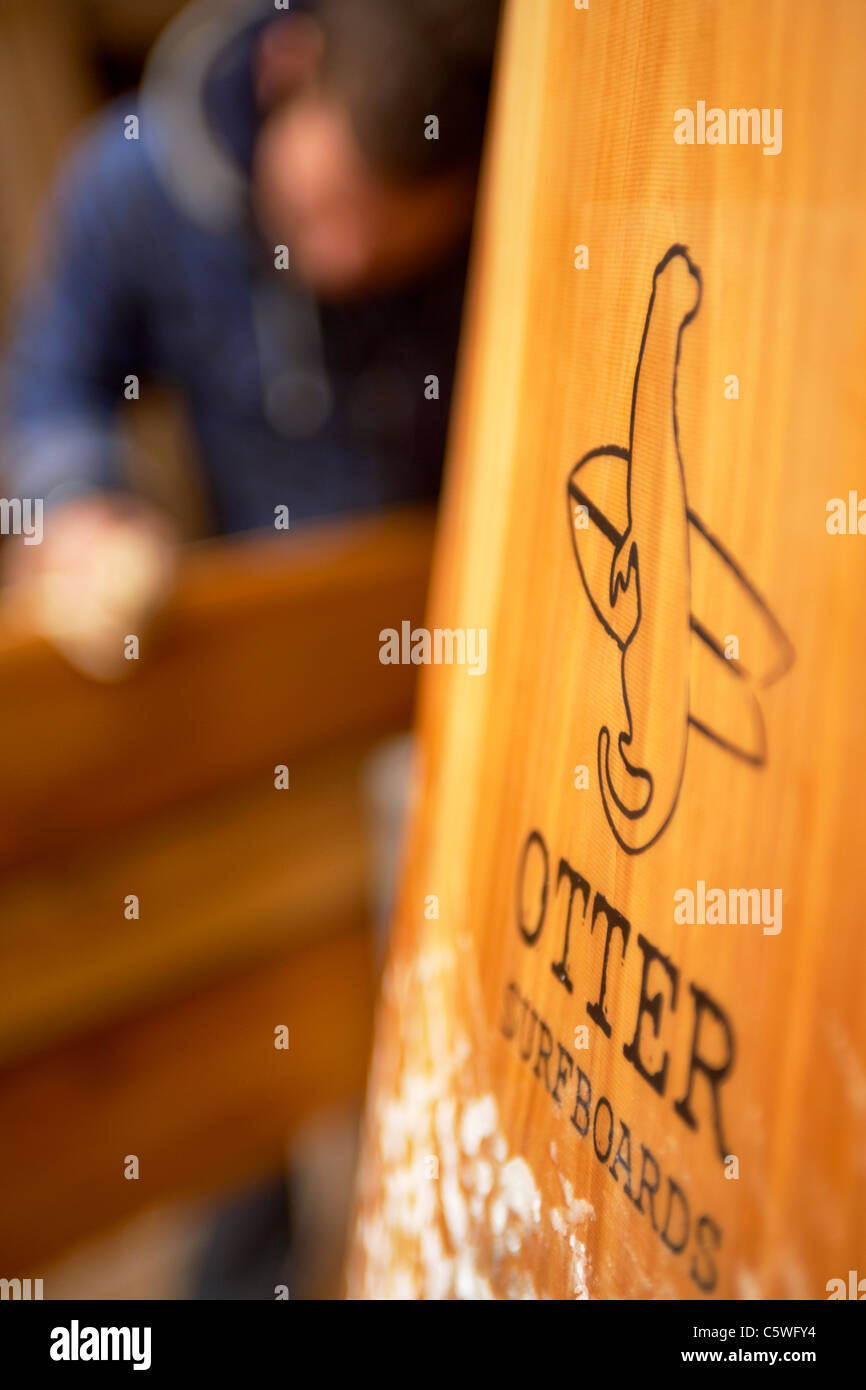 James Otter working on surfboard Stock Photo - Alamy