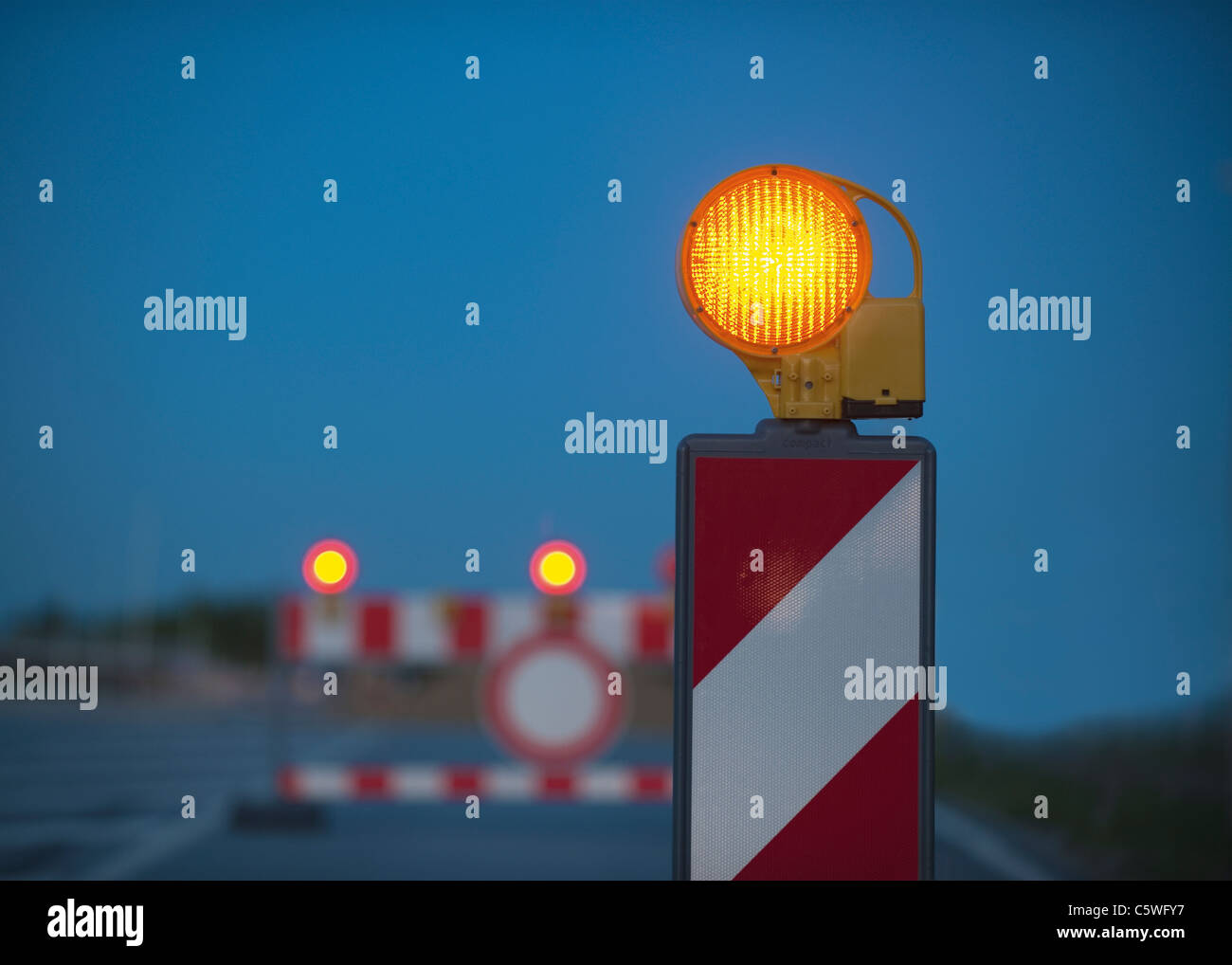 Germany, Warning lights and barricades at construaction site Stock ...