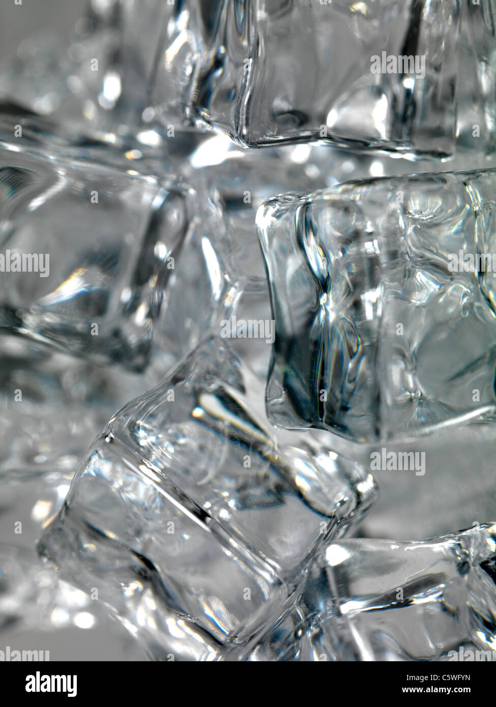 Frozen ice cubes isolated on a kitchen bench Stock Photo - Alamy