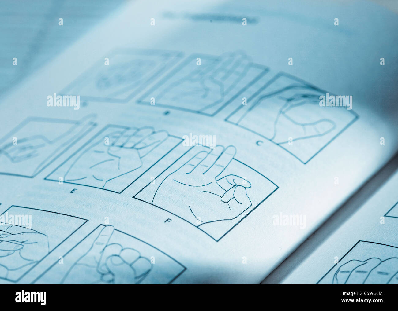 Sign languages in booklet, close up Stock Photo - Alamy