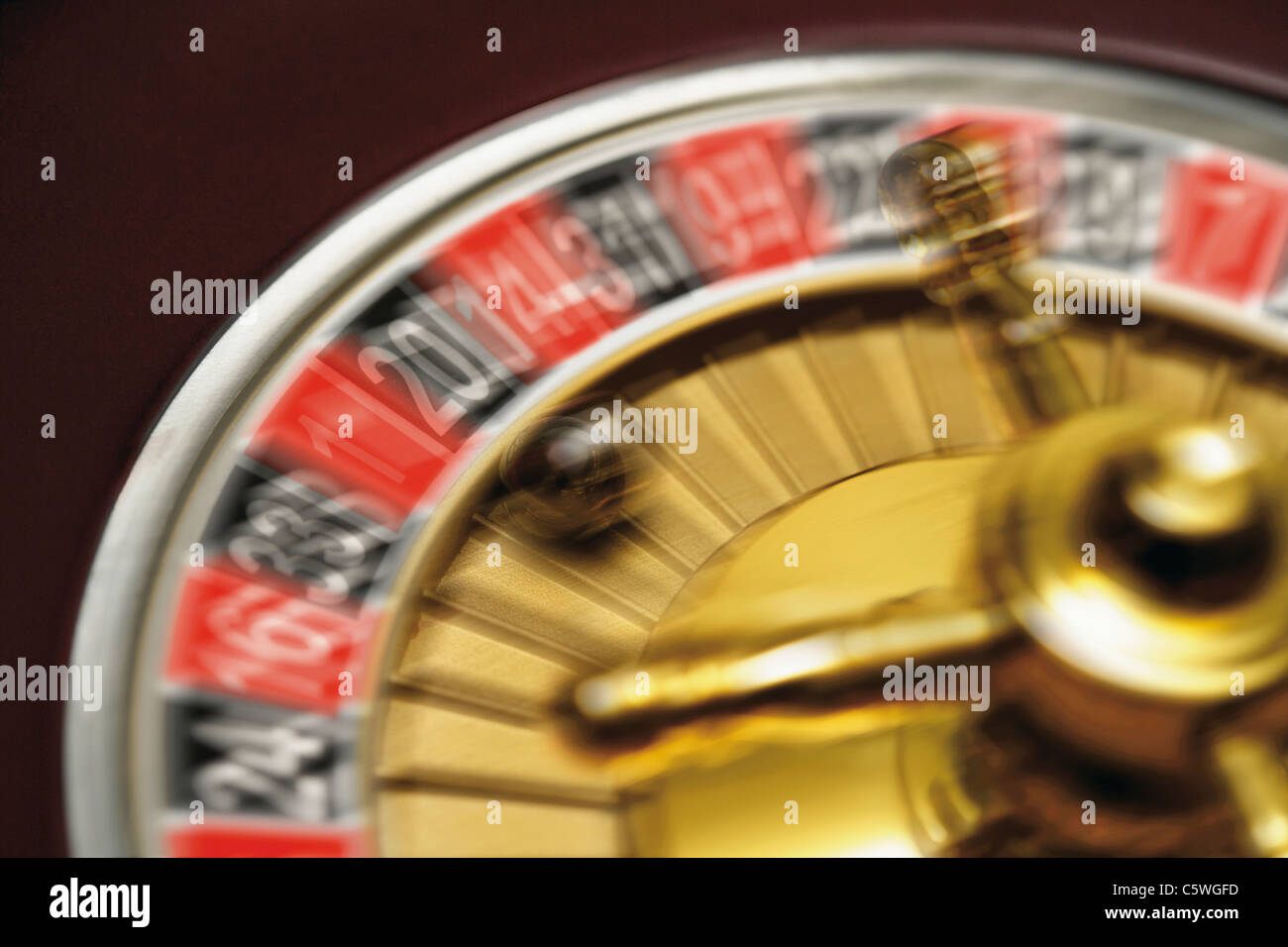 Moving roulette against brown background, close up Stock Photo - Alamy