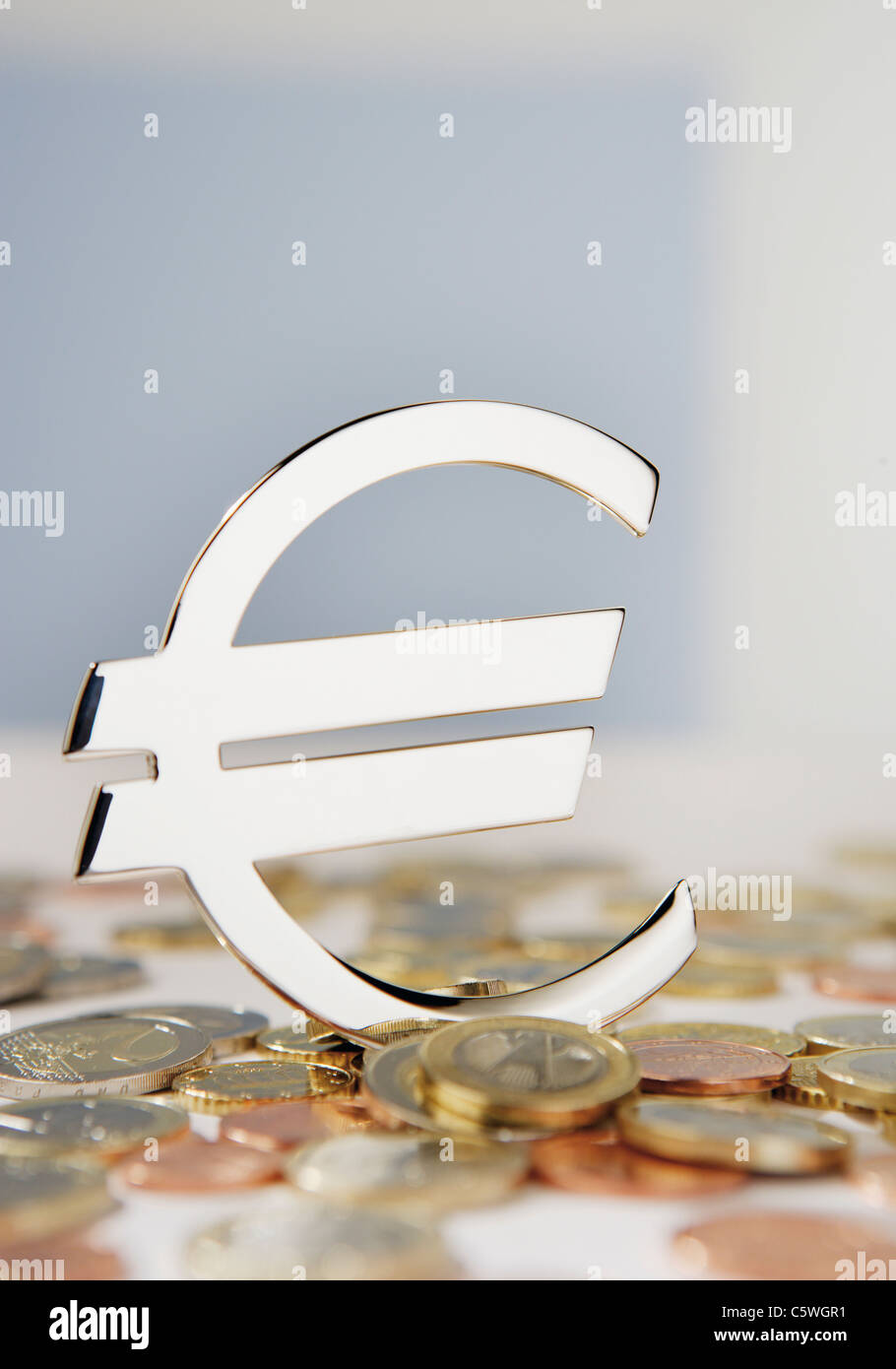Close up of euro sign with euro coins Stock Photo - Alamy