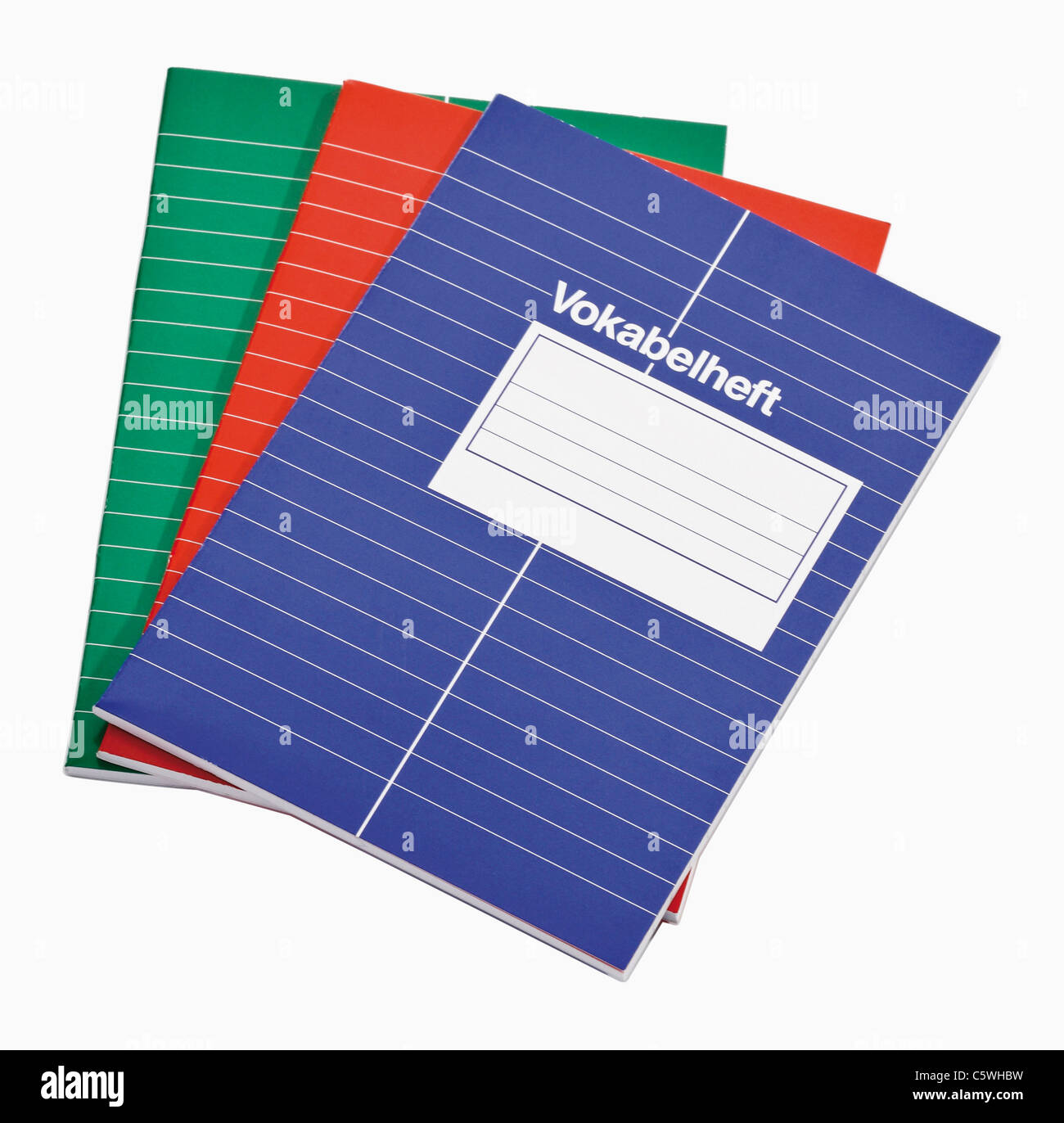 Three exercise books against white background, close-up Stock Photo - Alamy