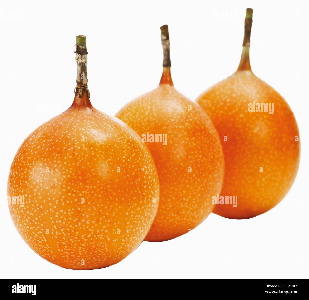 Granadillas against white background, close up Stock Photo - Alamy