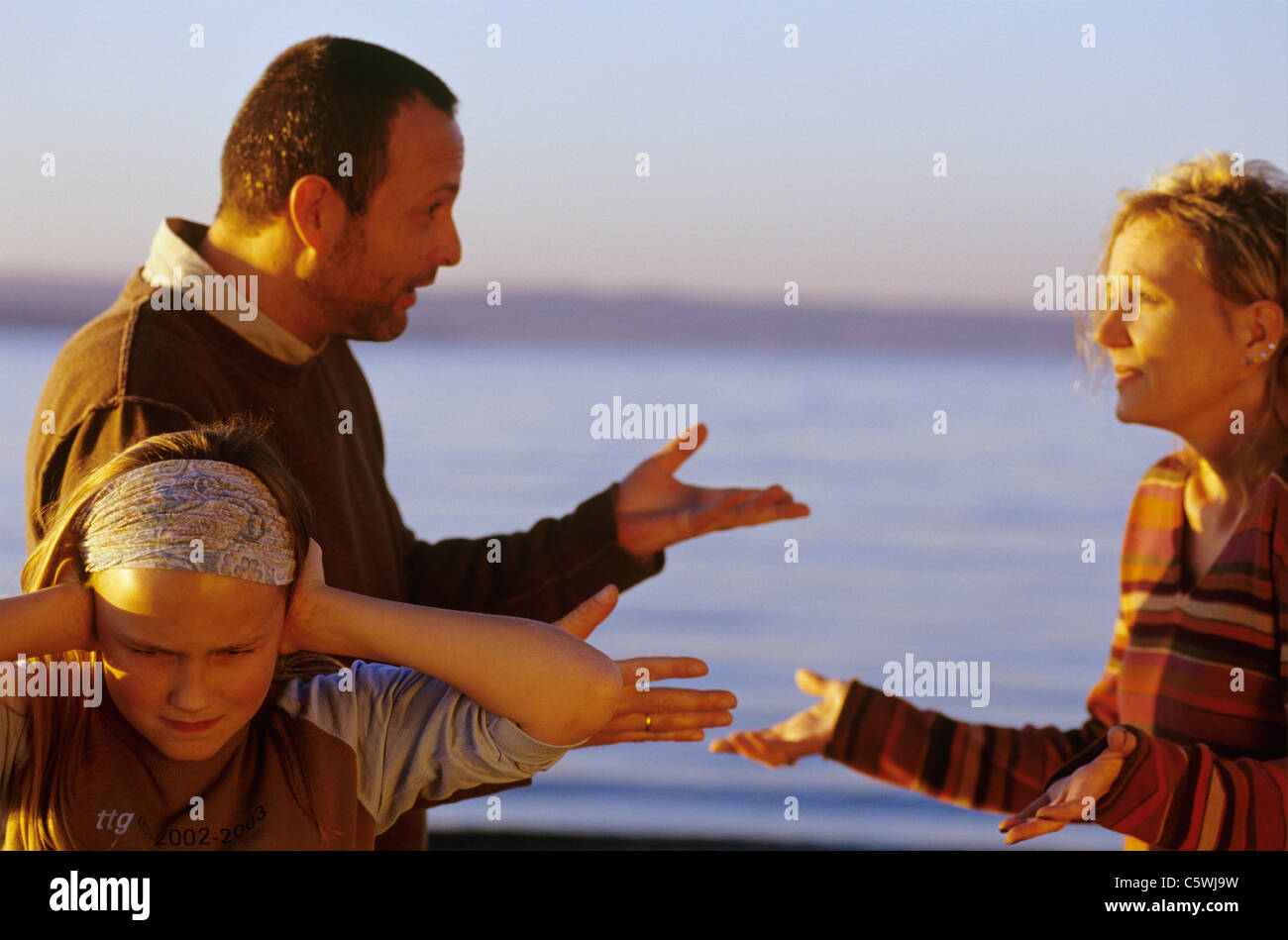 Argueing couple and child Stock Photo - Alamy