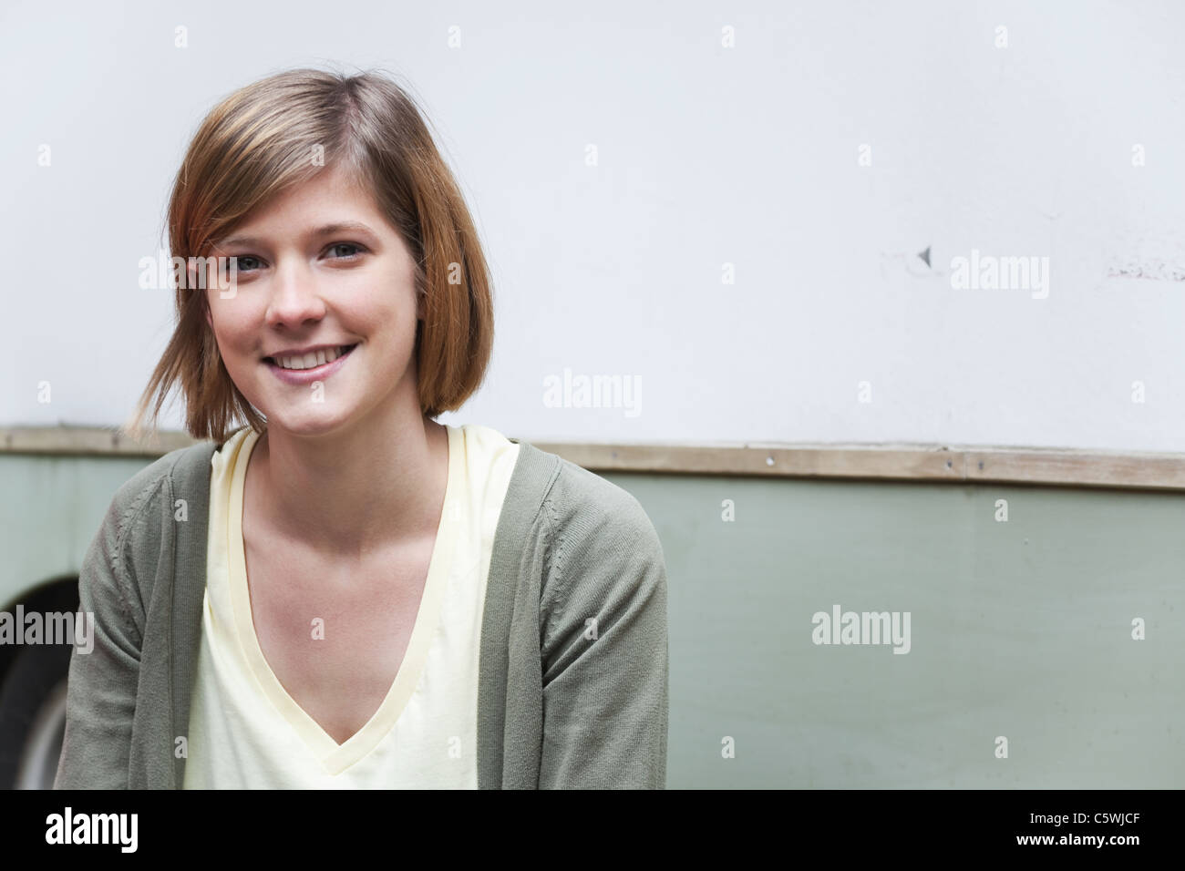 Germany, Berlin, Woman smiling, portrait Stock Photo - Alamy