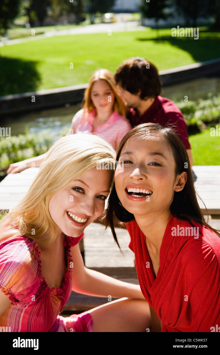 Germany, Bavaria, Upper Bavaria, Two young women in beer garden ...