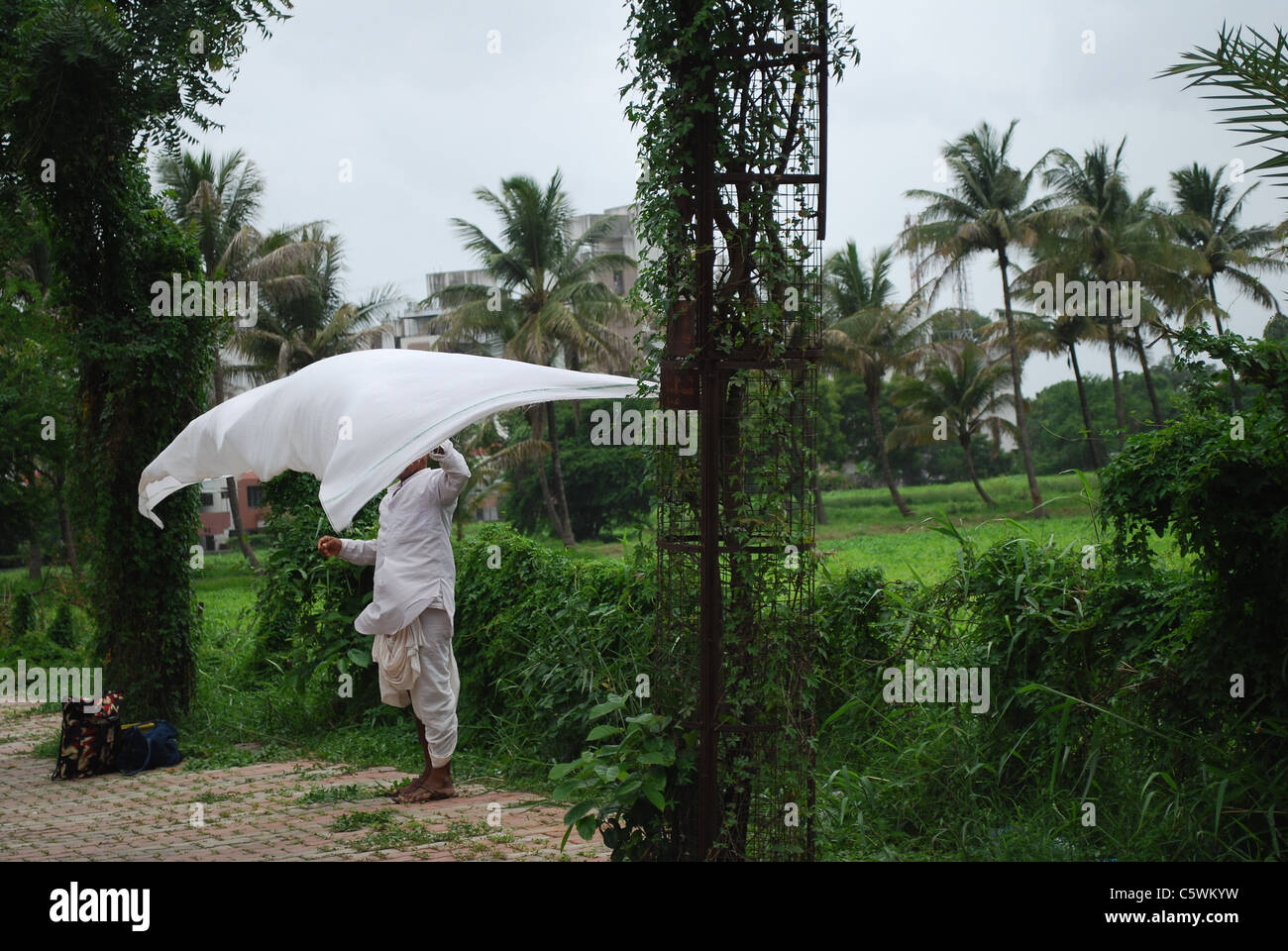 Man drying cloth hi-res stock photography and images - Alamy