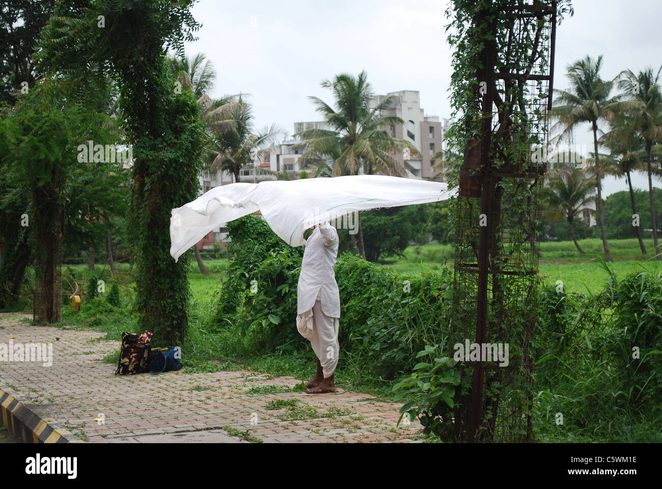 Man drying cloth hi-res stock photography and images - Alamy