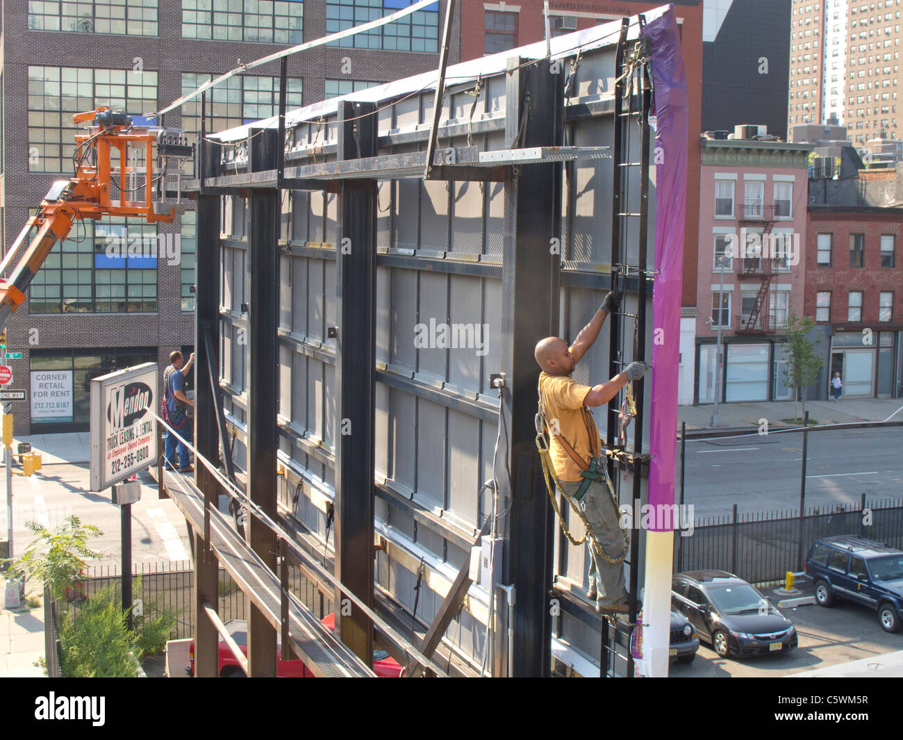 men working on billboard Stock Photo - Alamy