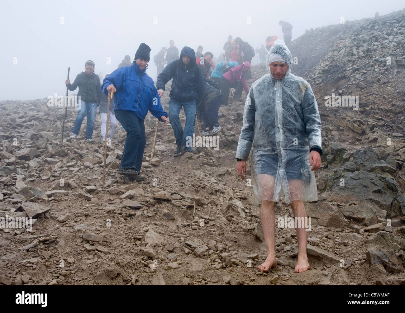 Pilgrims on the descent of Croagh Patrick, 'Reek Sunday', 2011 Stock ...