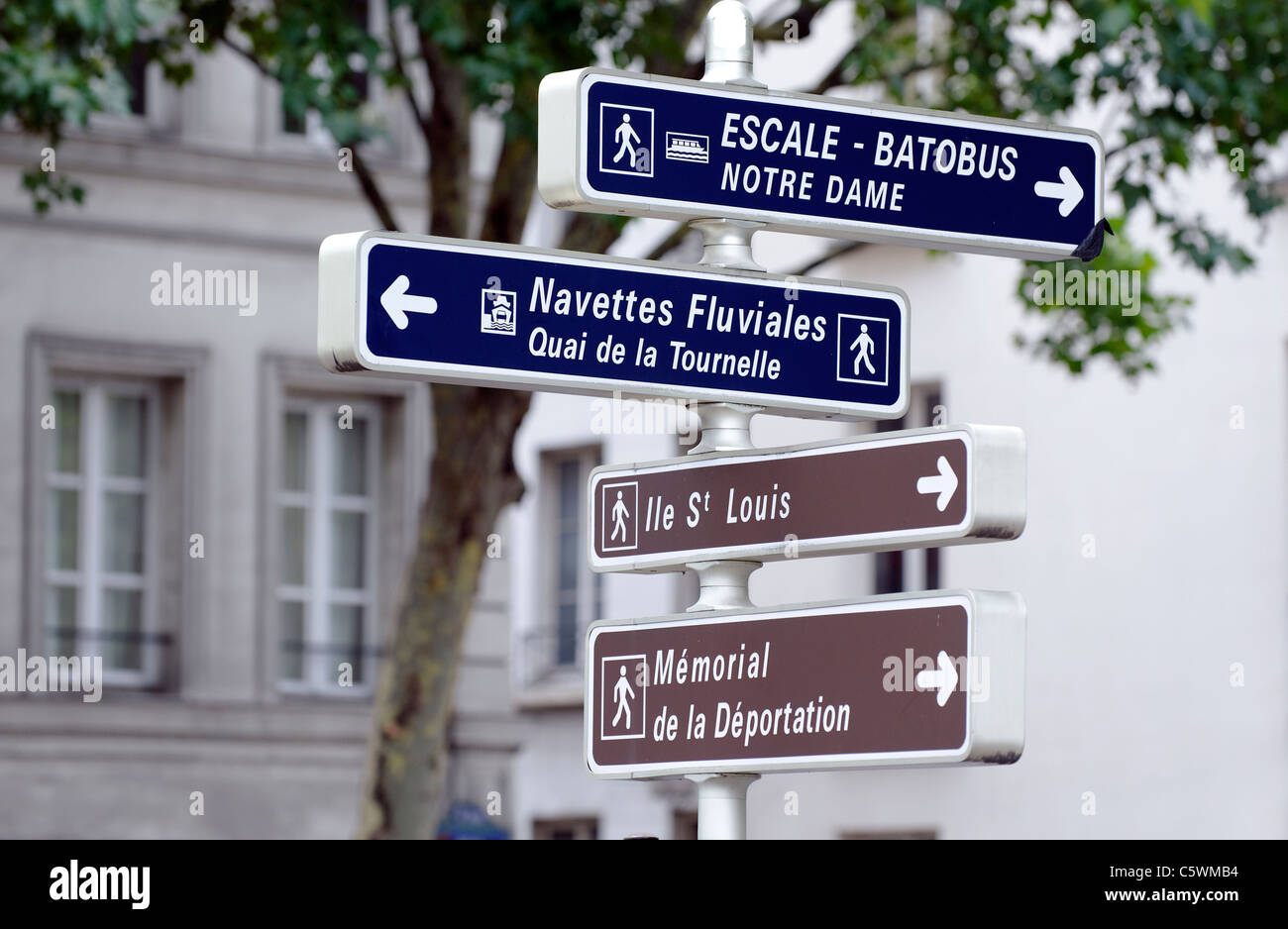 Paris directions - signs for the water bus and more Stock Photo - Alamy