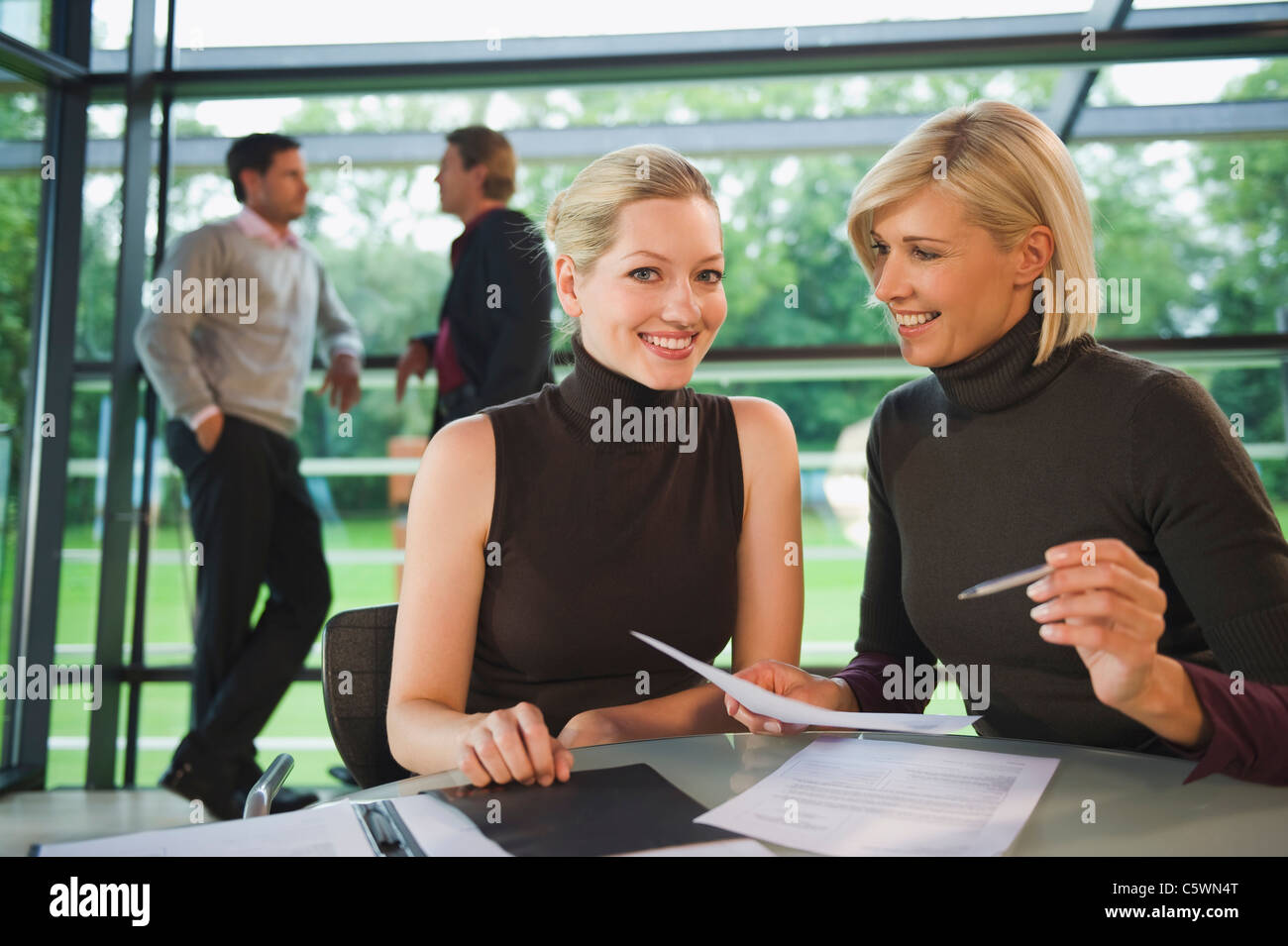 Germany, business people in meeting Stock Photo - Alamy