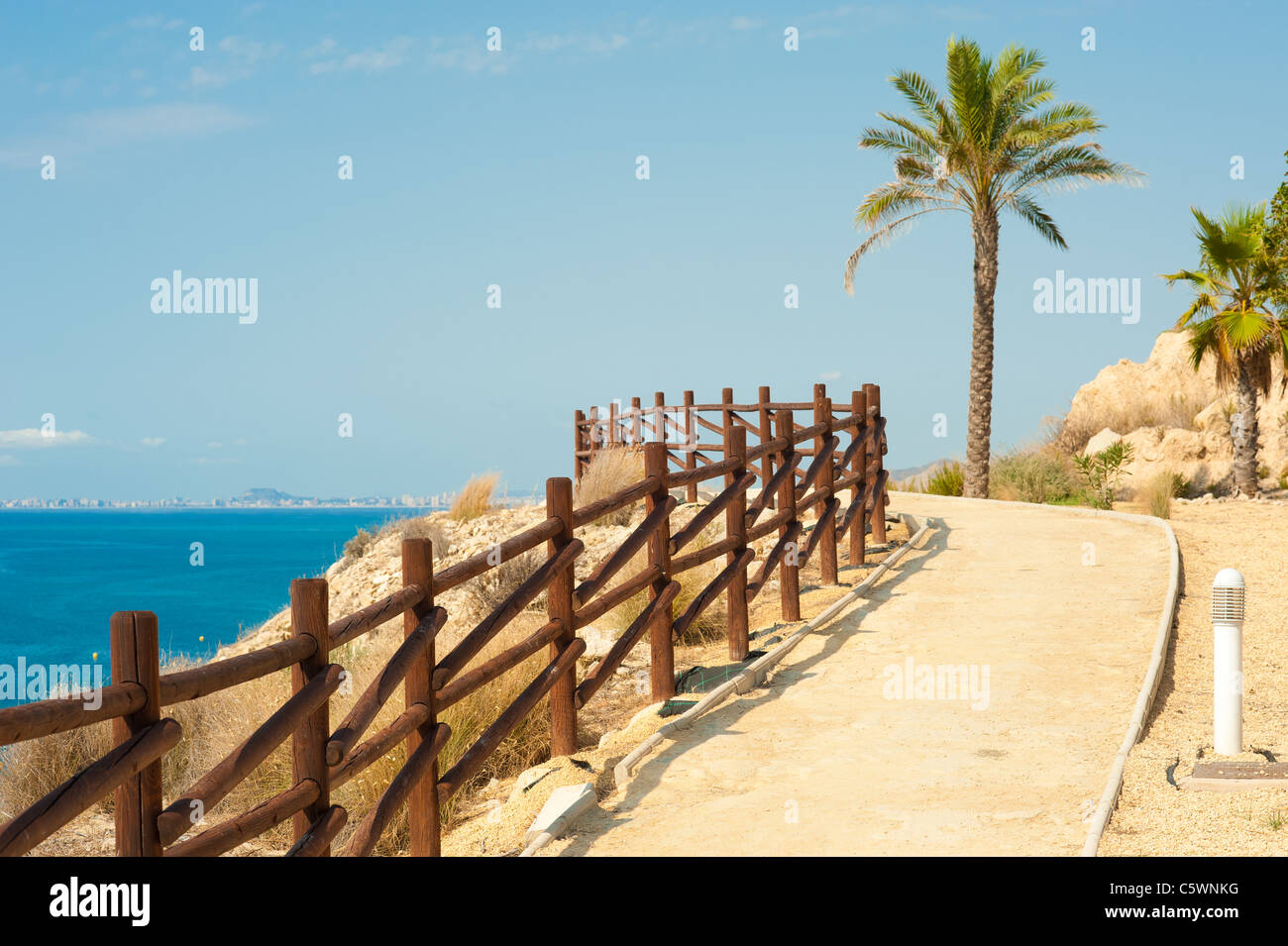 Scenic footpath winding atop a cliff above the Mediterranean Stock ...