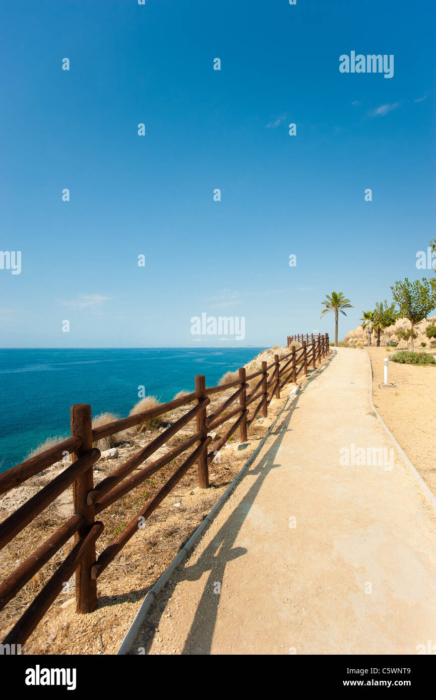 Scenic footpath winding atop a cliff above the Mediterranean Stock ...