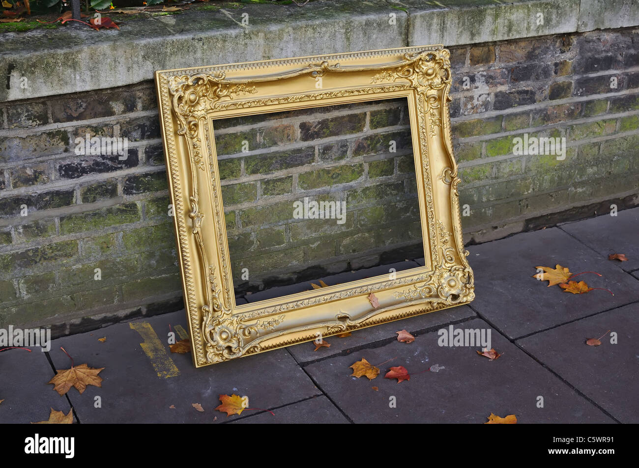Picture frame on the street Stock Photo - Alamy