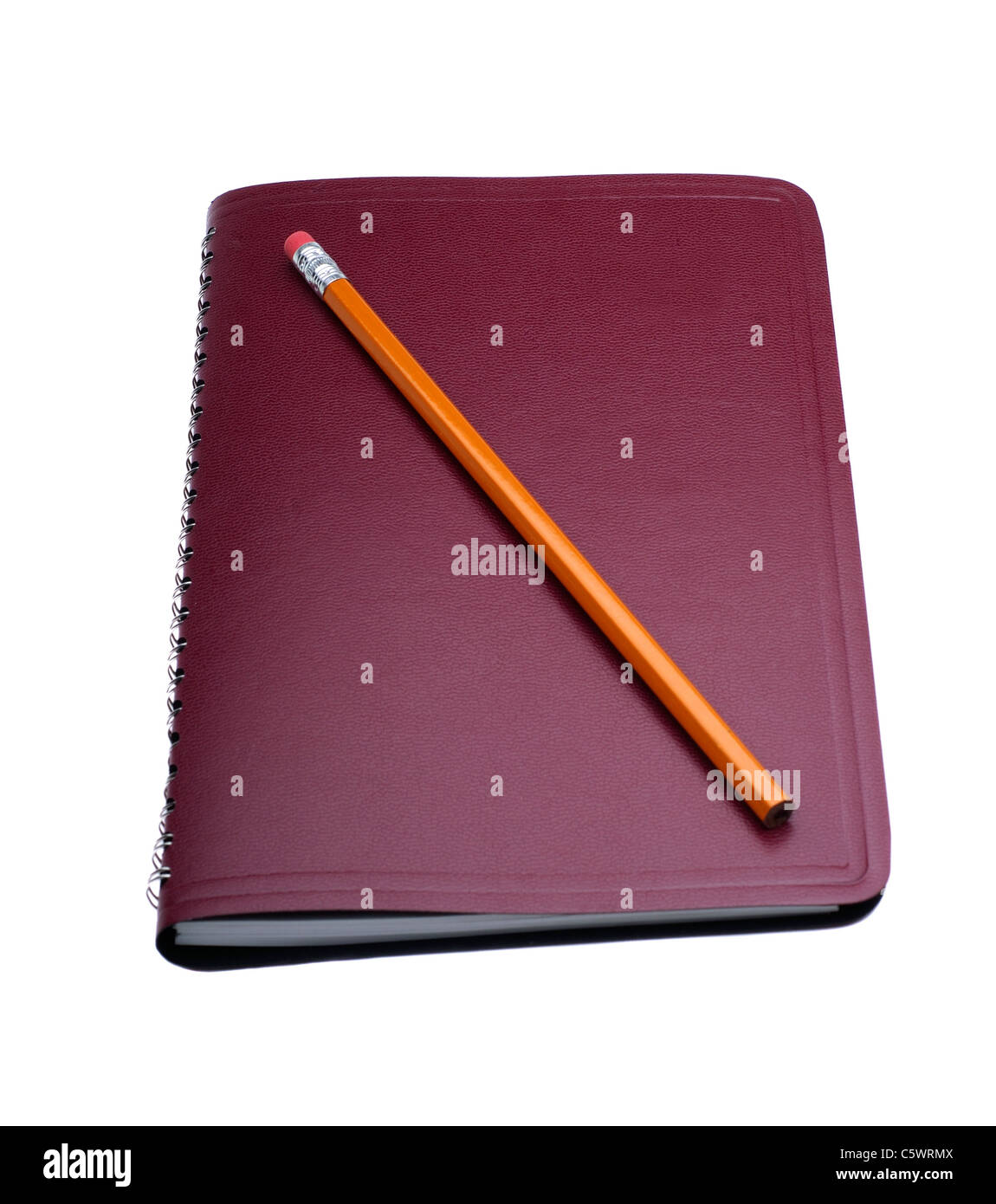 Burgundy Colored 2007 Diary With A Brown Pencil, Isolated Over White ...