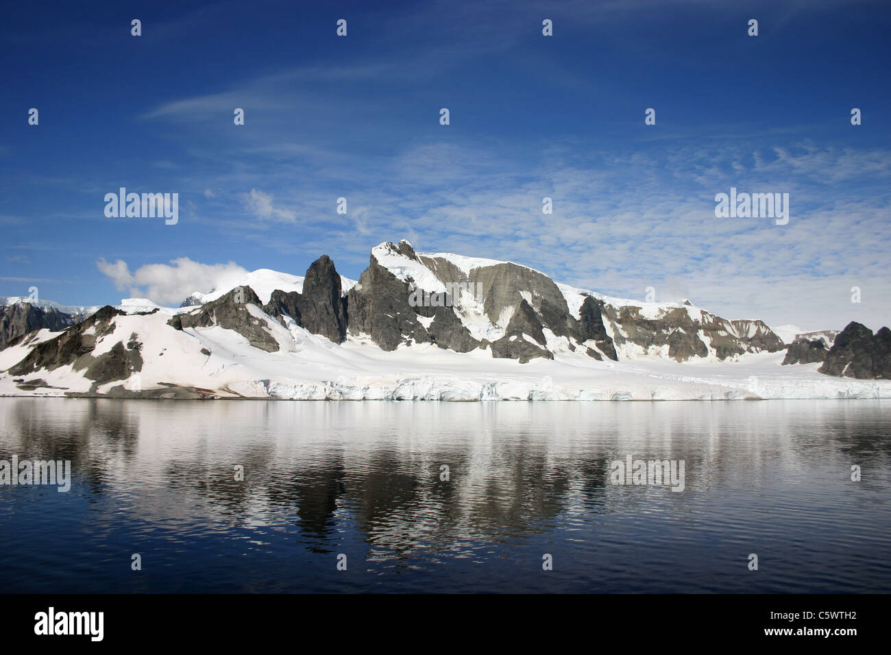 Landscape with glacier, mountains and rocks in Antarctica Stock Photo ...