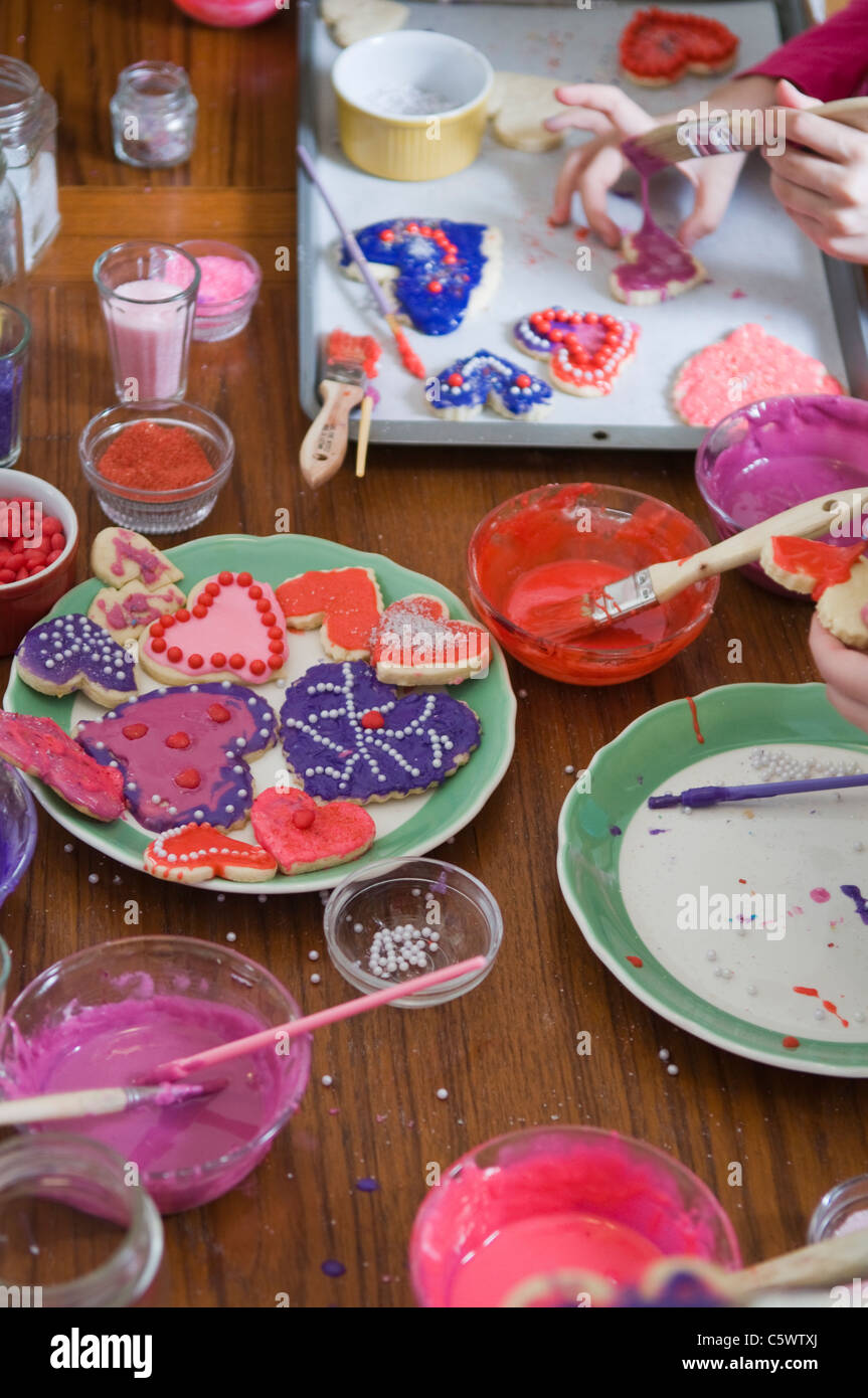 Valentine's Day cookie decorating party Stock Photo - Alamy