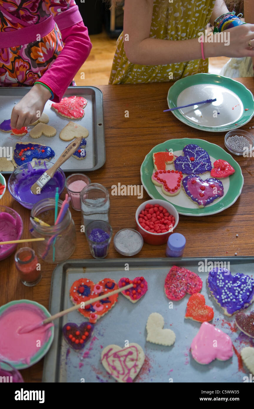 Valentine's Day cookie decorating party Stock Photo - Alamy