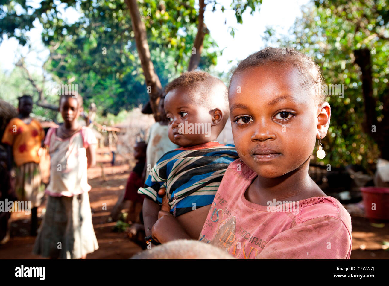 The friendly faces of local children at a Ari tribal village near Jinka ...