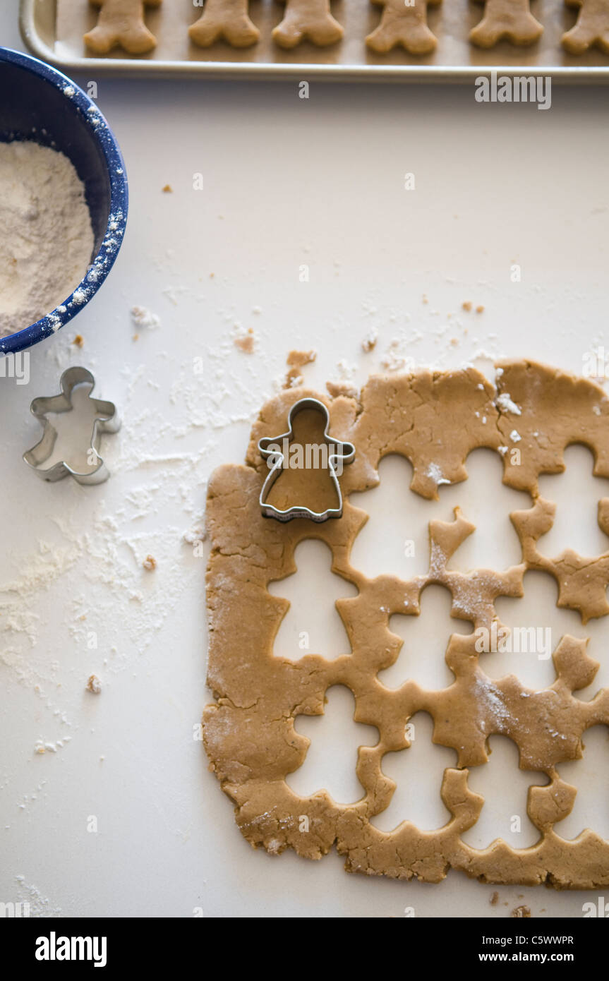 Making Gingerbread people Stock Photo - Alamy