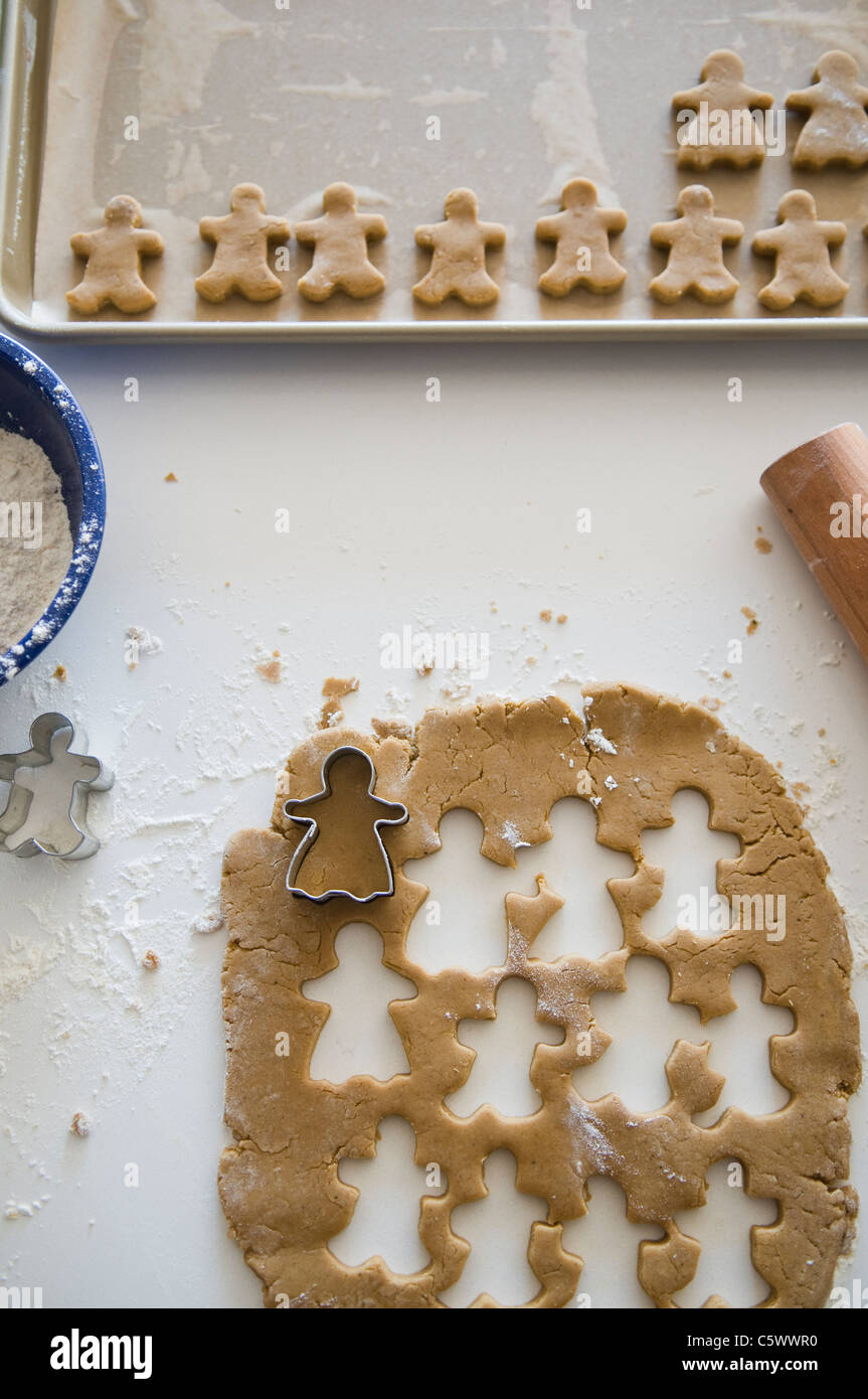 Making Gingerbread people Stock Photo - Alamy