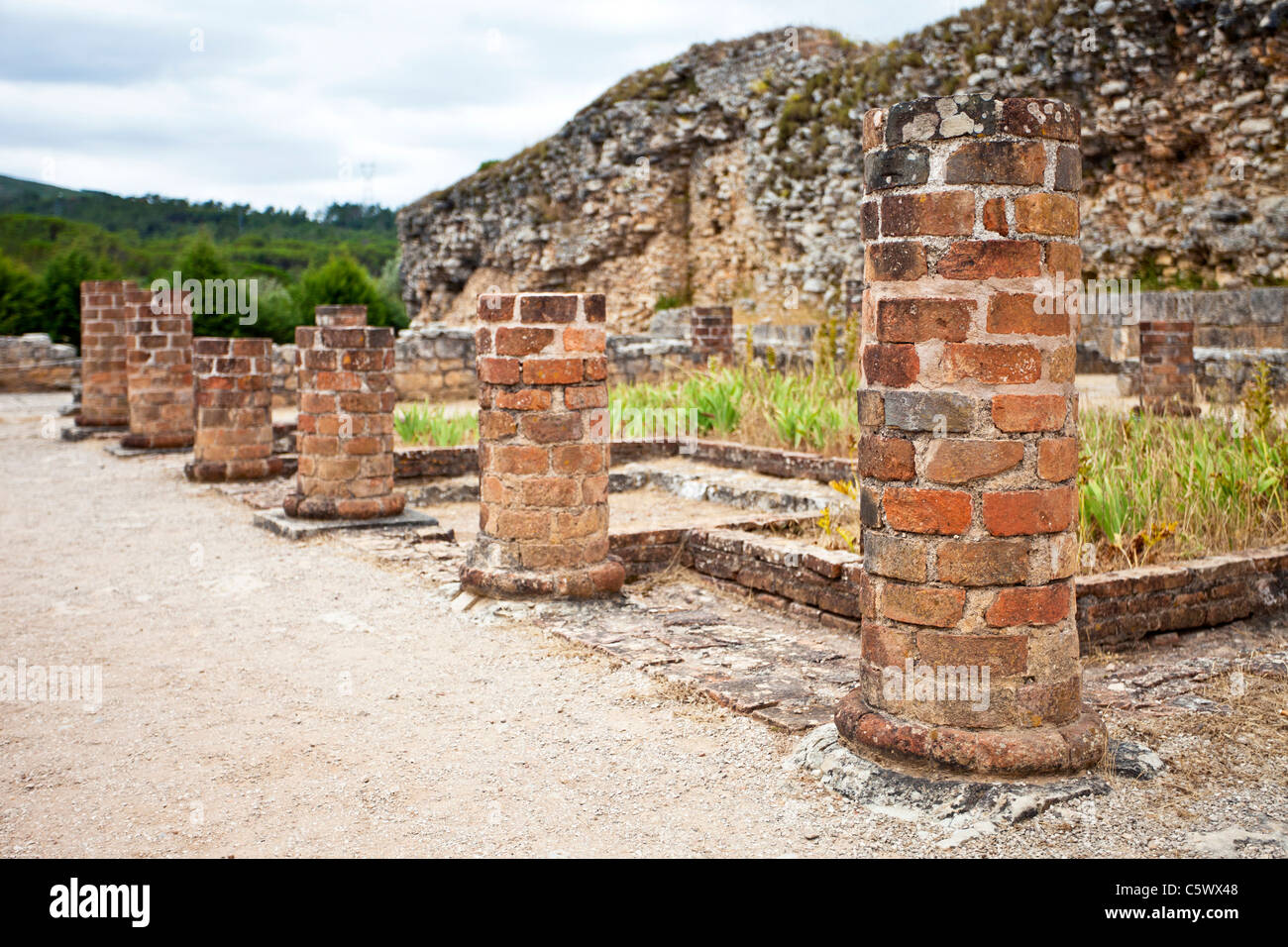 Peristyle with brick columns in the House of the Skeletons Villa in ...