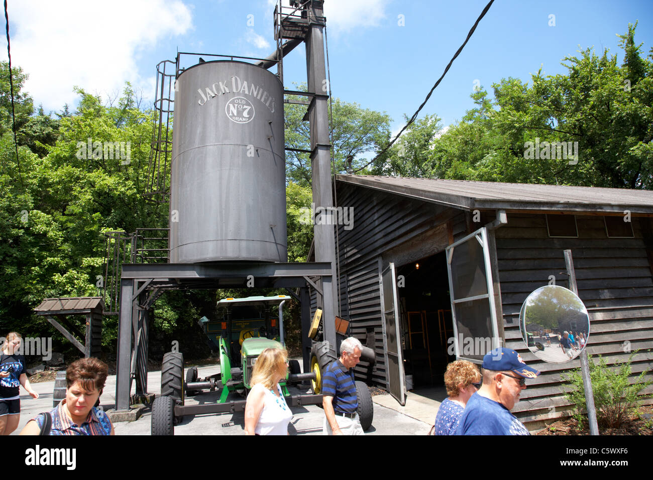tourists on tour of the jack daniels distillery Lynchburg , tennessee ...