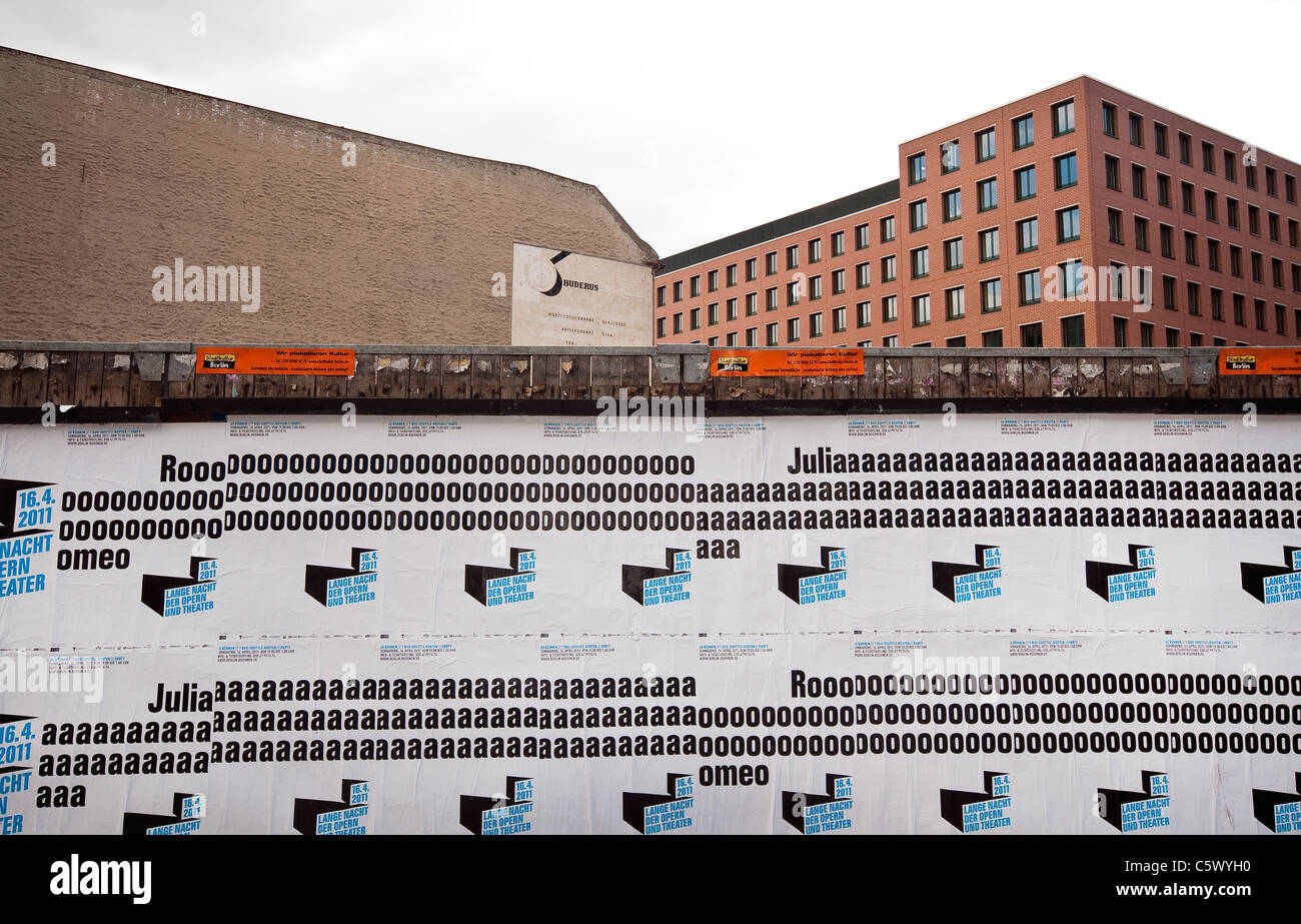 Fly poster advertising in Berlin, Germany Stock Photo - Alamy