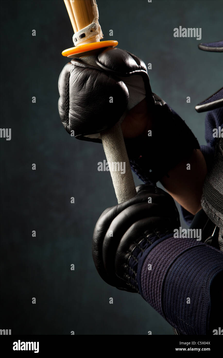 Kendo player with shinai Stock Photo - Alamy