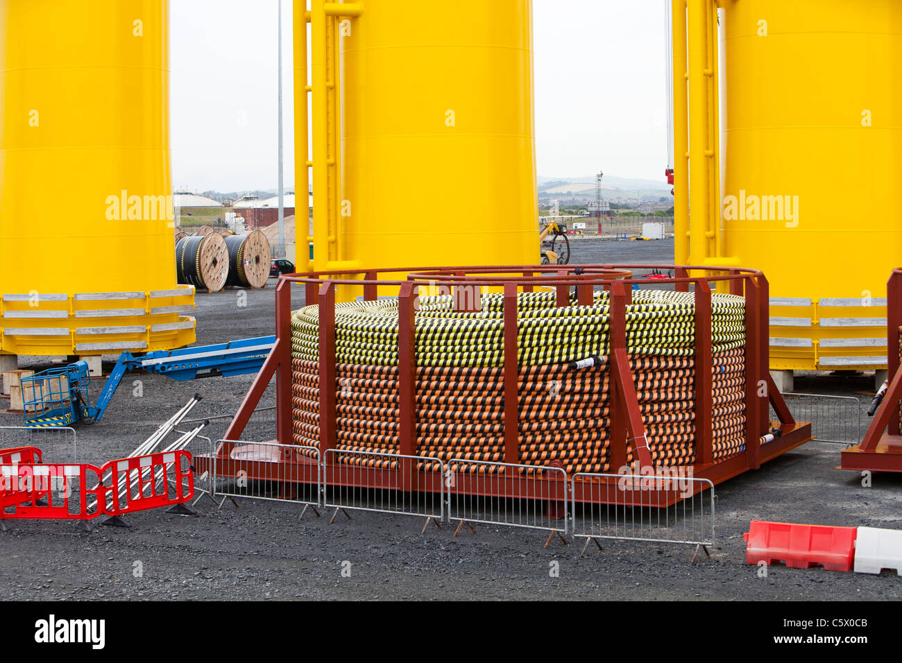 Transition pieces for the Walney offshore wind farm on the docks at ...