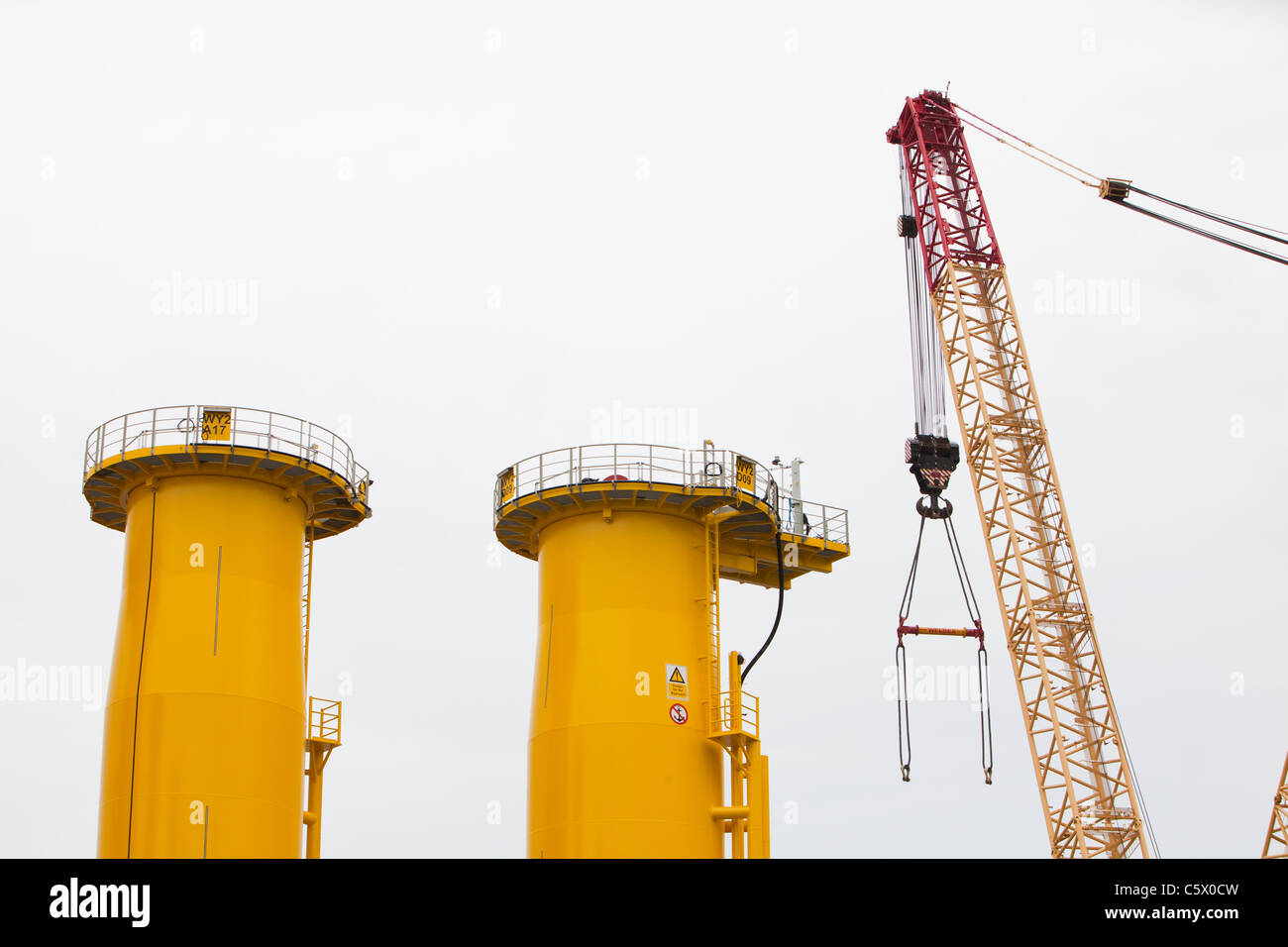 Transition pieces for the Walney offshore wind farm on the docks at ...