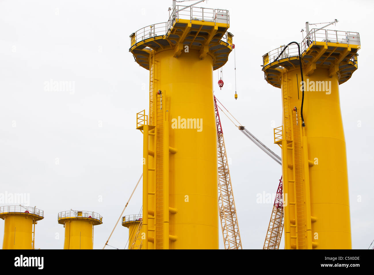 Transition pieces for the Walney offshore wind farm on the docks at ...