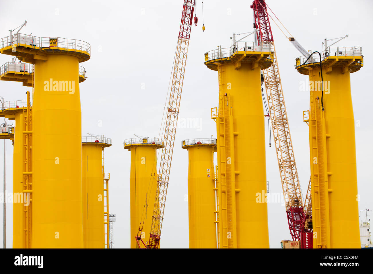 Transition pieces for the Walney offshore wind farm on the docks at ...