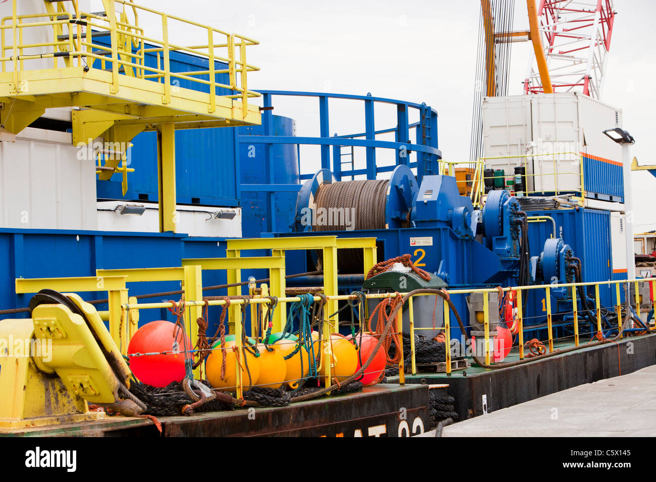 A specialist cable laying vessel being loaded with cable for the Walney ...