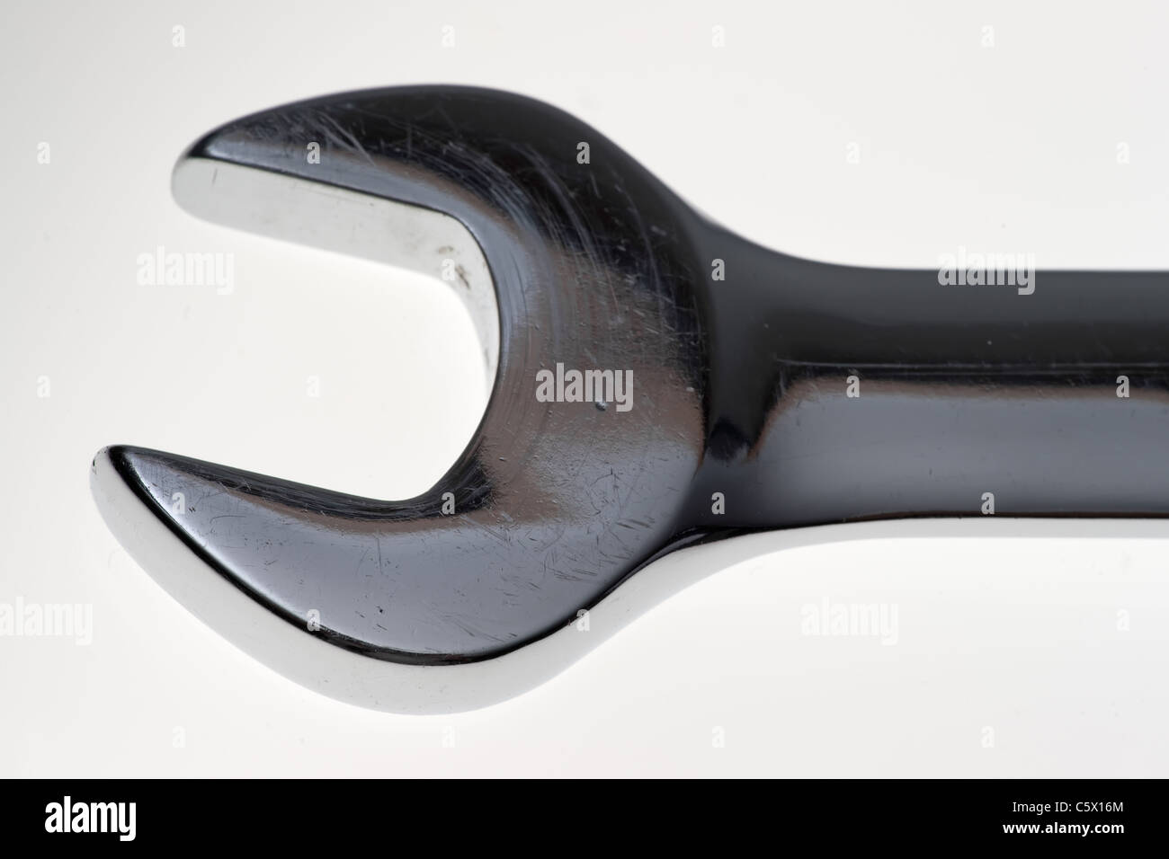 Extreme close up of a wrench head over white background Stock Photo - Alamy
