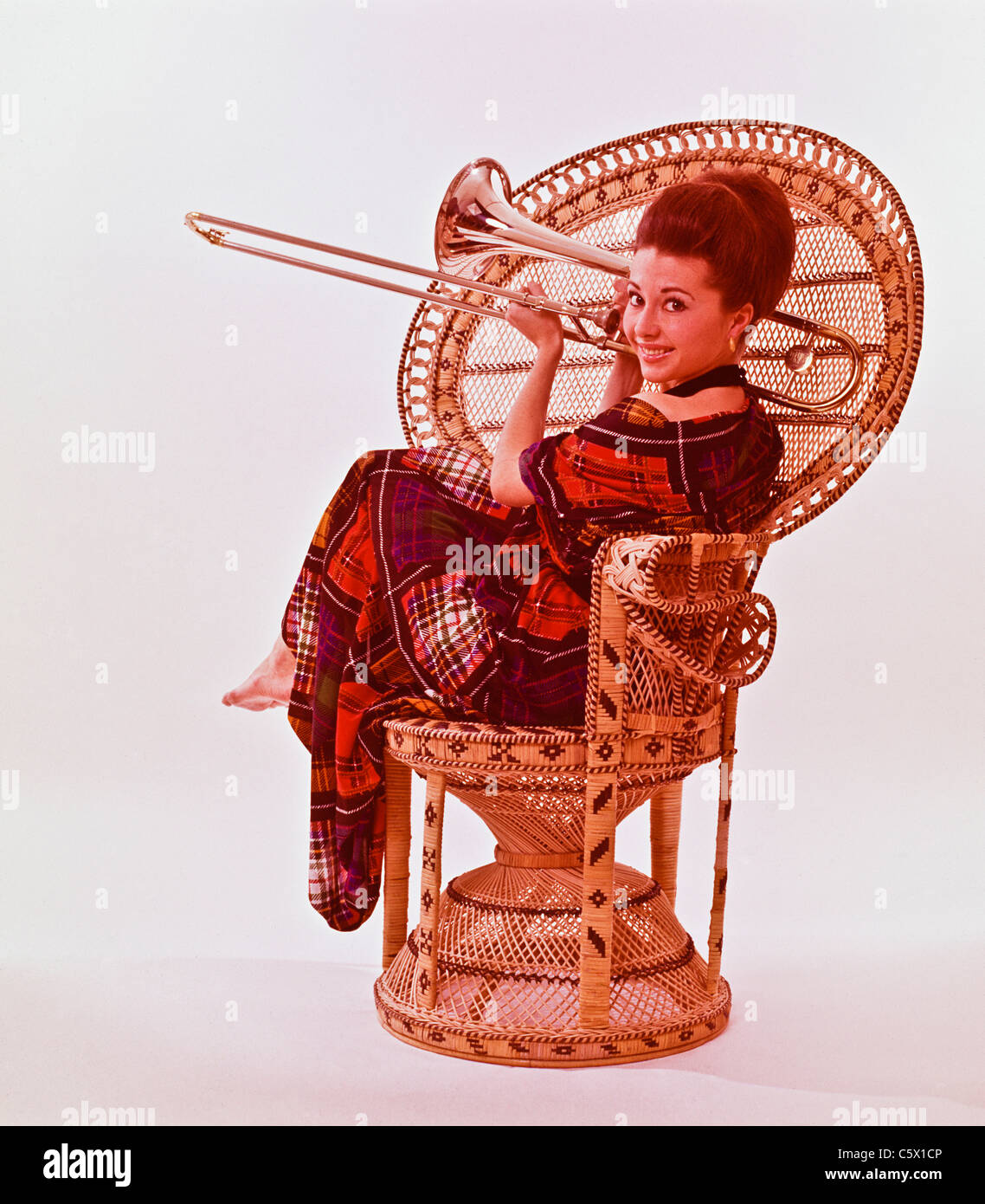 Woman playing trombone hi-res stock photography and images - Alamy