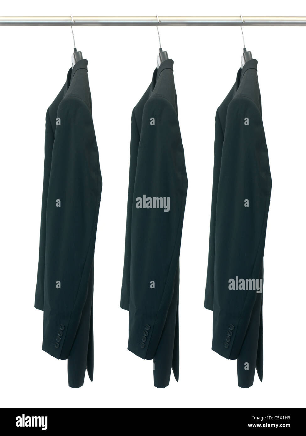 Garments hanging on coat hanger isolated against a white background ...