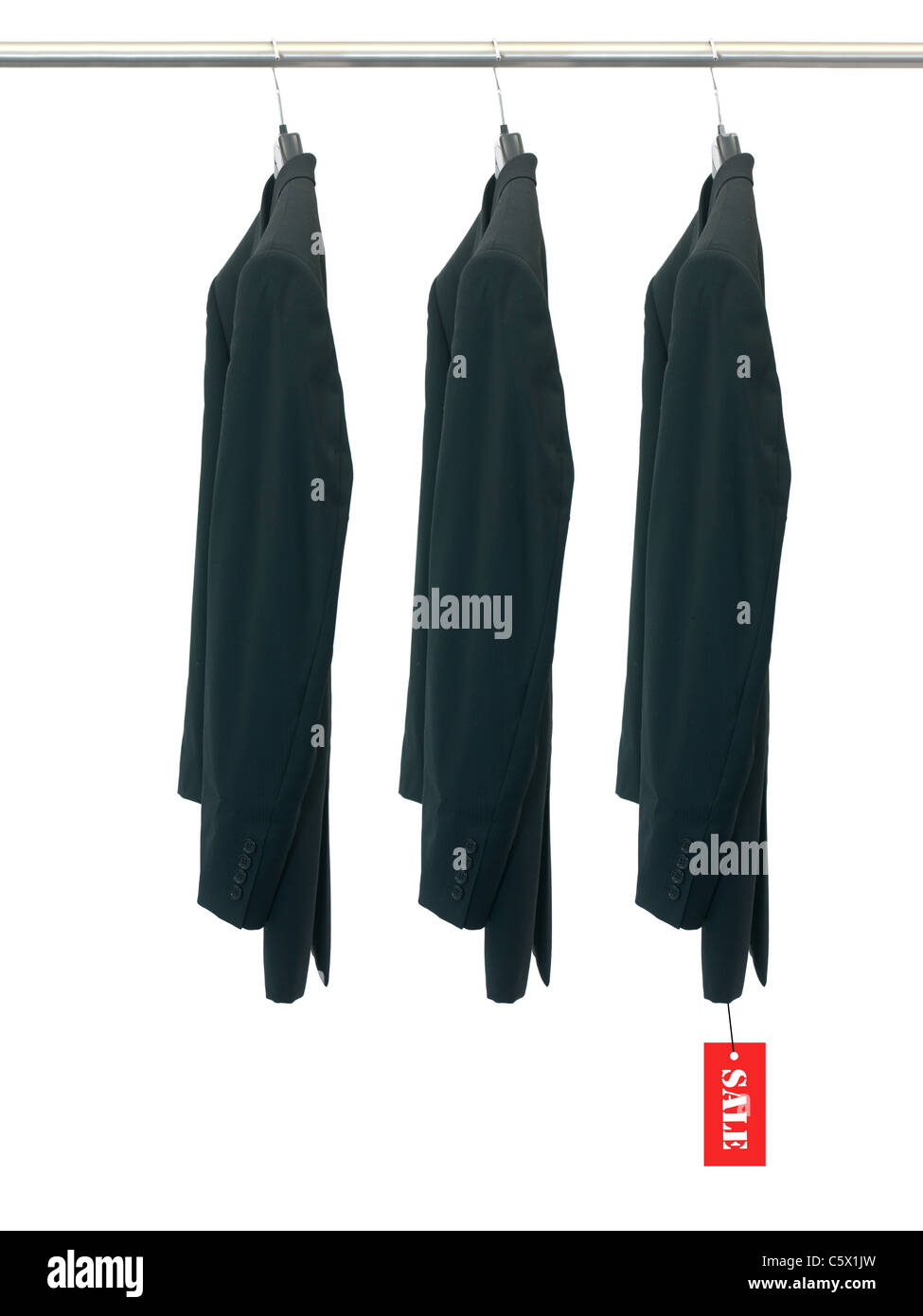 Garments hanging on coat hanger isolated against a white background ...