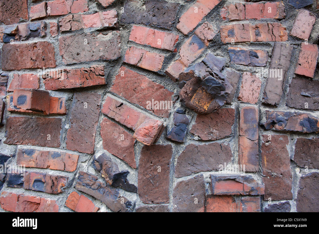 Red, brown, and black old klinker brick wall Stock Photo - Alamy